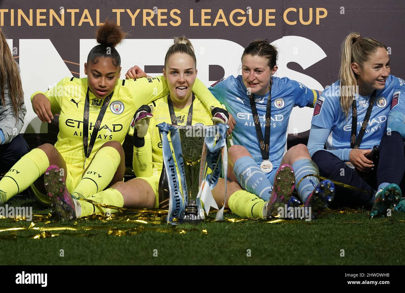 Manchester City goalkeeper Ellie Roebuck with the trophy as her team ...