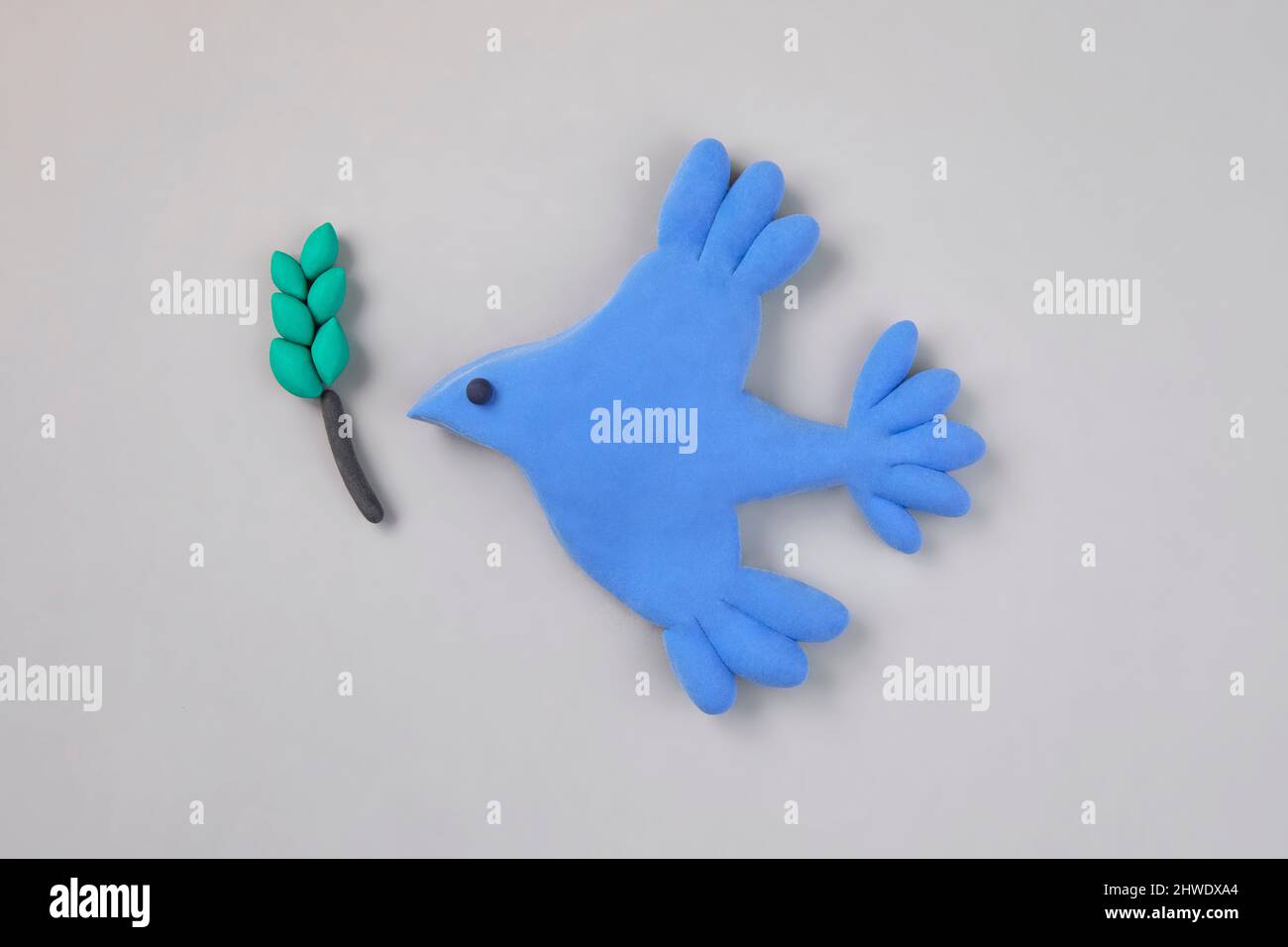 Dove of peace with olive branch, abstract bird figure, concept of peace ...