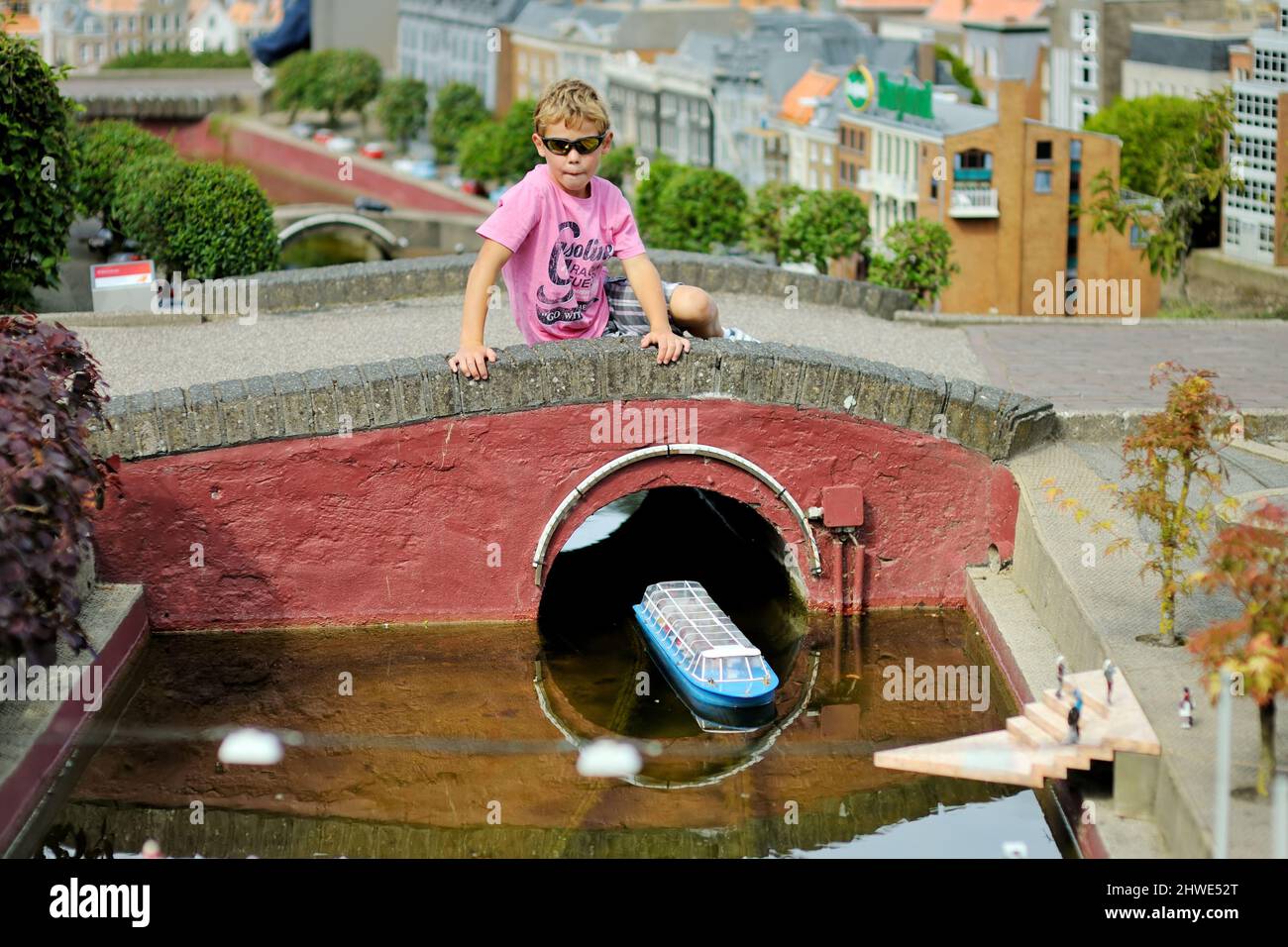 THE HAGUE, NETHERLANDS - AUGUST 2011: Little boy having fun at ...