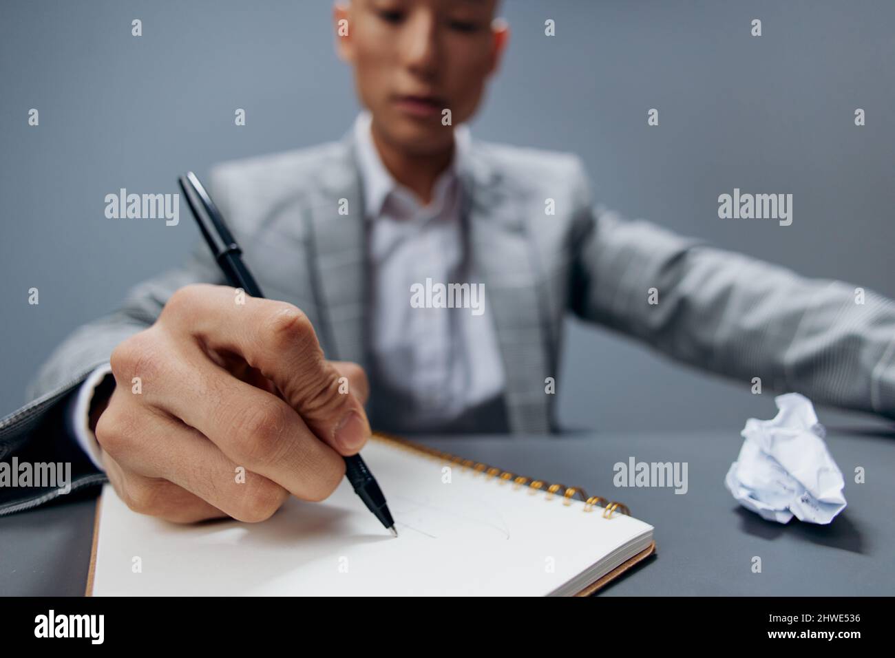 worker sits in the office emotions nervous breakdown anger isolated ...