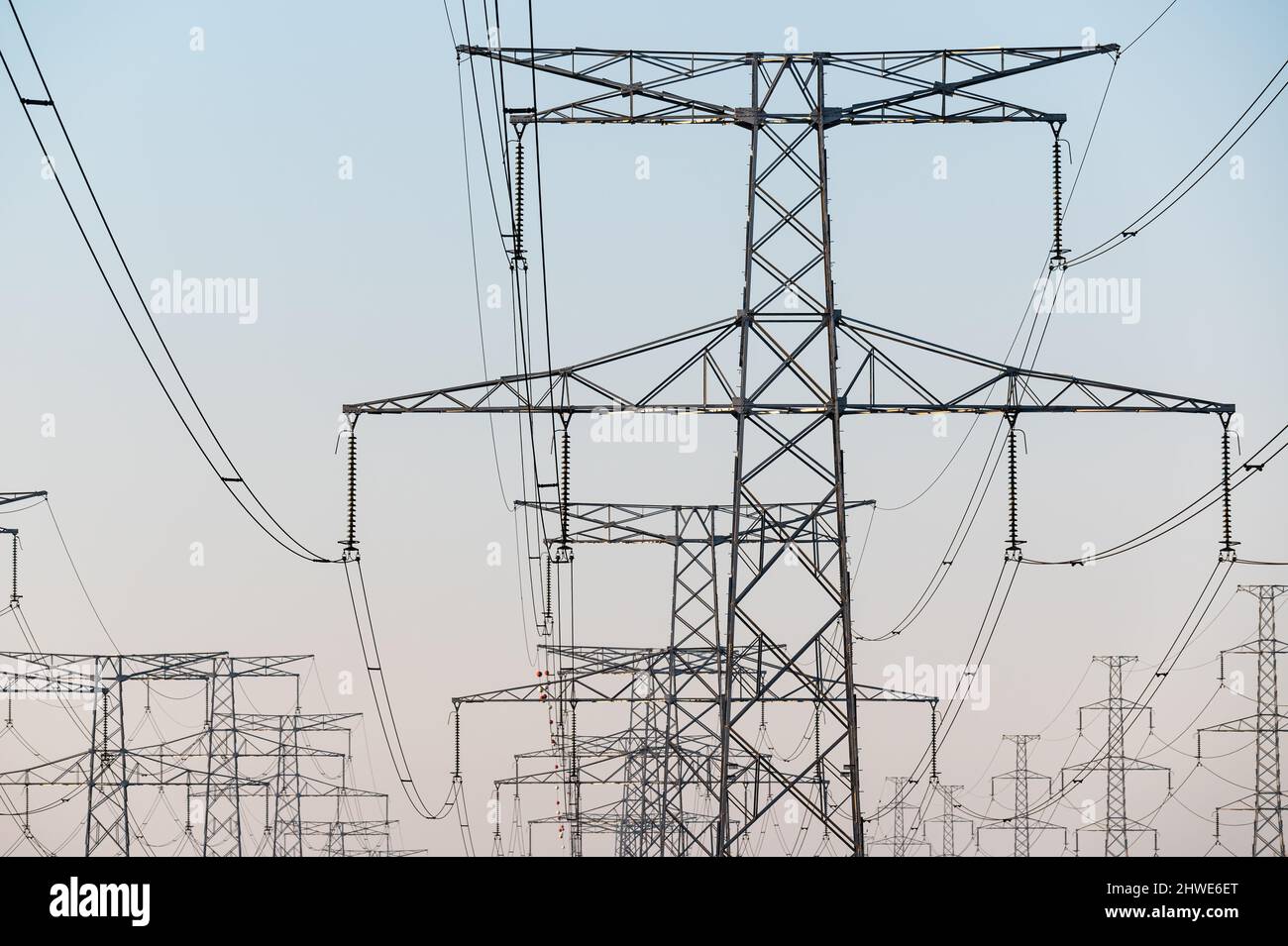 High voltage wires at a transmission tower for the distribution of ...