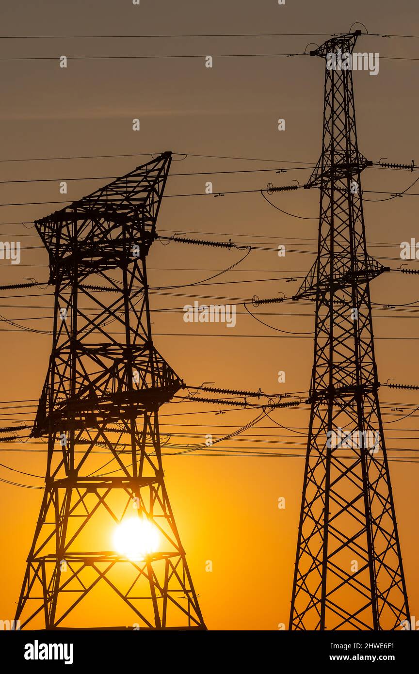 High voltage wires at a transmission tower for the distribution of ...