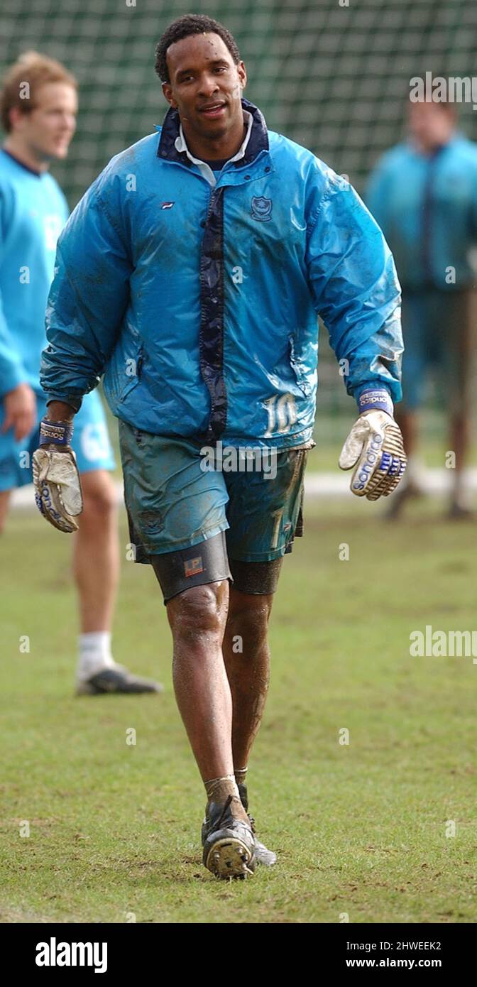 PORTSMOUTH GOALKEEPER SHAKA HISLOP GOES TO DRY OFF AFTER MAKING A ...