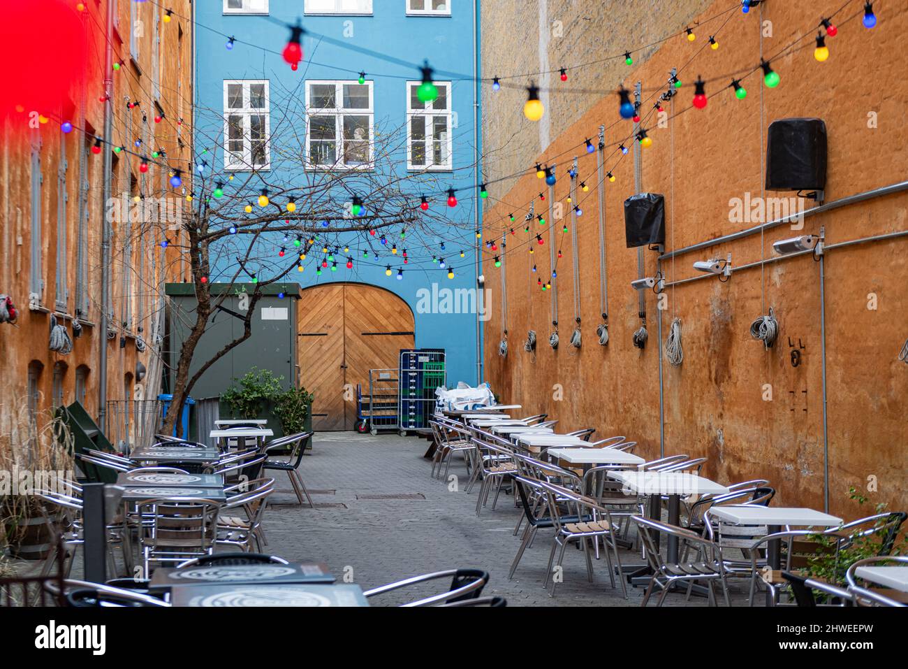 Street views of Copenhagen Denmark at a local street cafe that welcomes ...