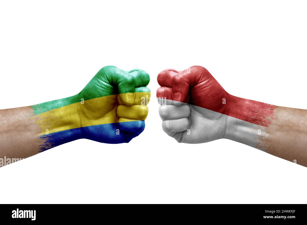 Two hands punch to each others on white background. Country flags ...