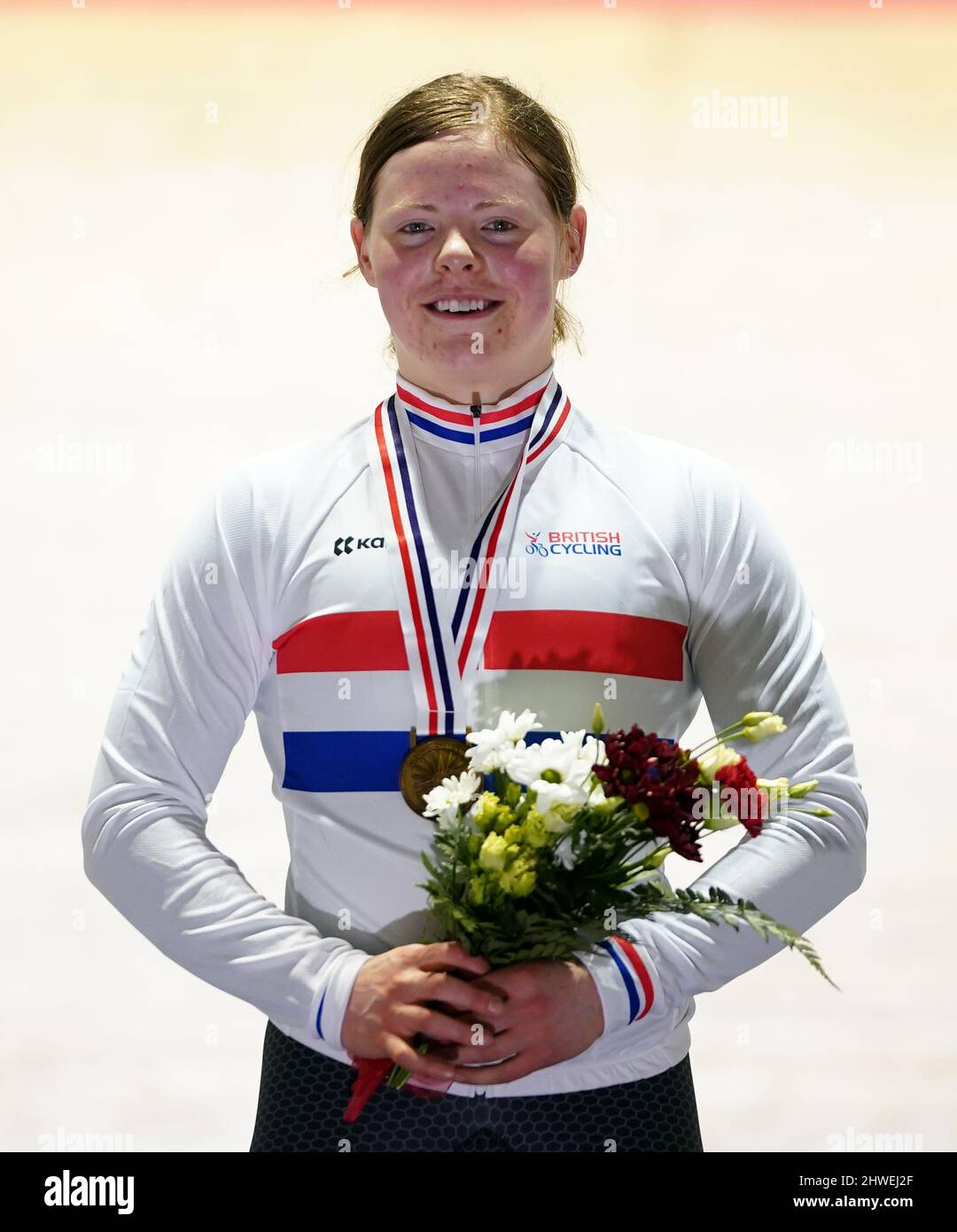Ellie Stone, gold, celebrates on the podium for the women's keirin ...