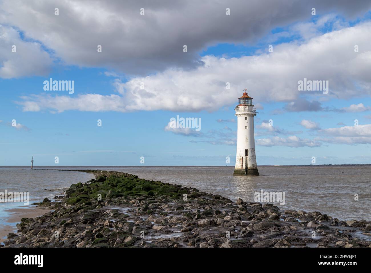 Perch Rock Lighthouse captured as a high dynamic range image next to ...