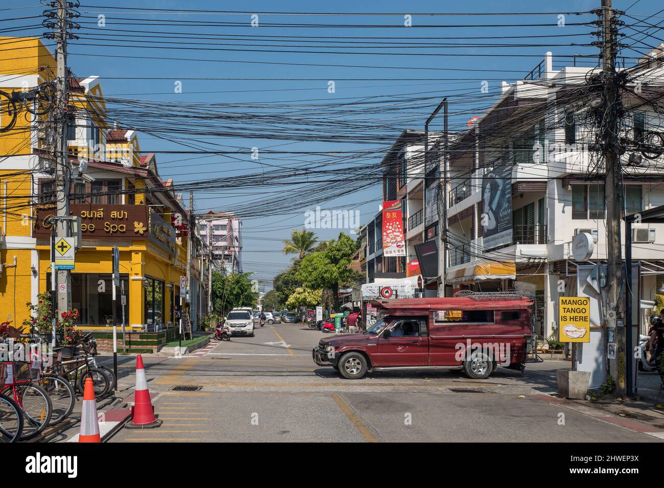 Traditional red songthaew in Chiang Mai. This ancient town is a popular ...