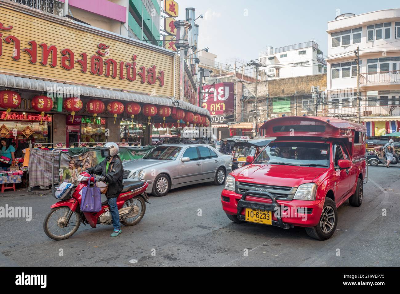 Traditional red songthaew in Chiang Mai. This ancient town is a popular ...