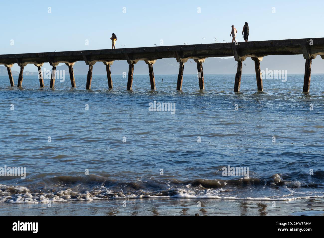 Tokomaru Bay new Zealand - February 4 2022; From sea level silhouettes ...