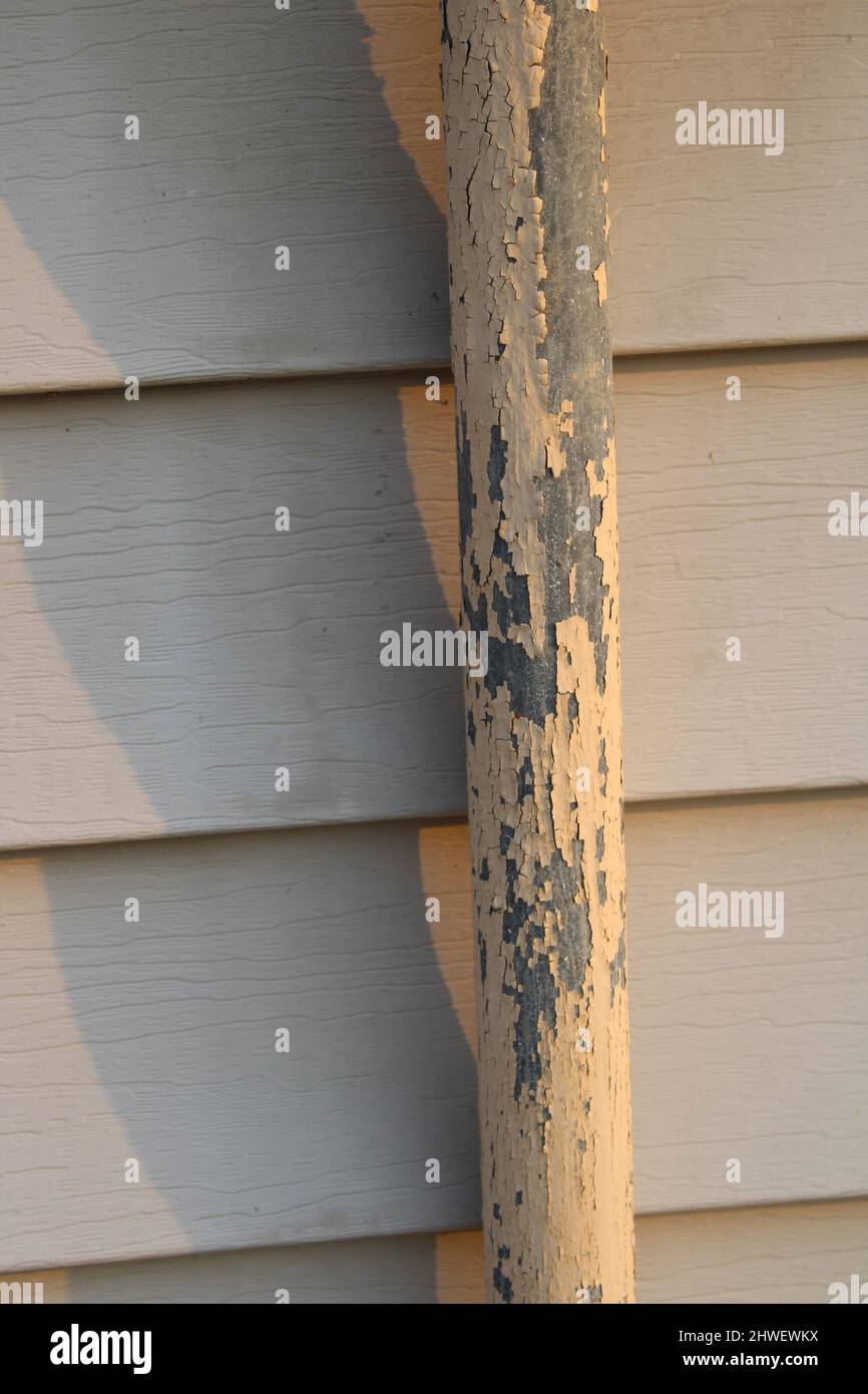 Paint Flaking off of an Old Metal Pipe Stock Photo - Alamy