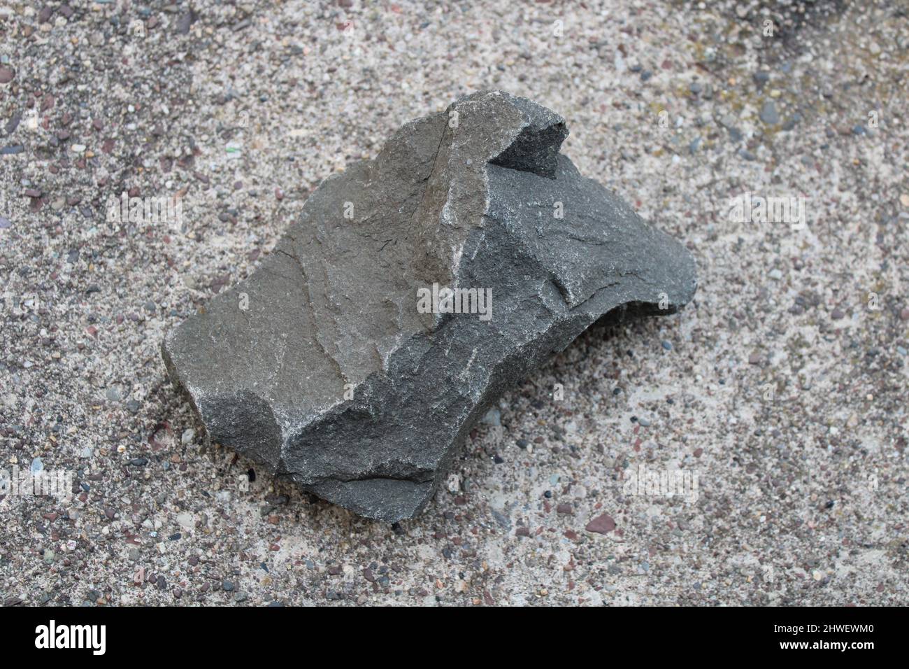 A Common Gray Landscaping Rock Stock Photo - Alamy
