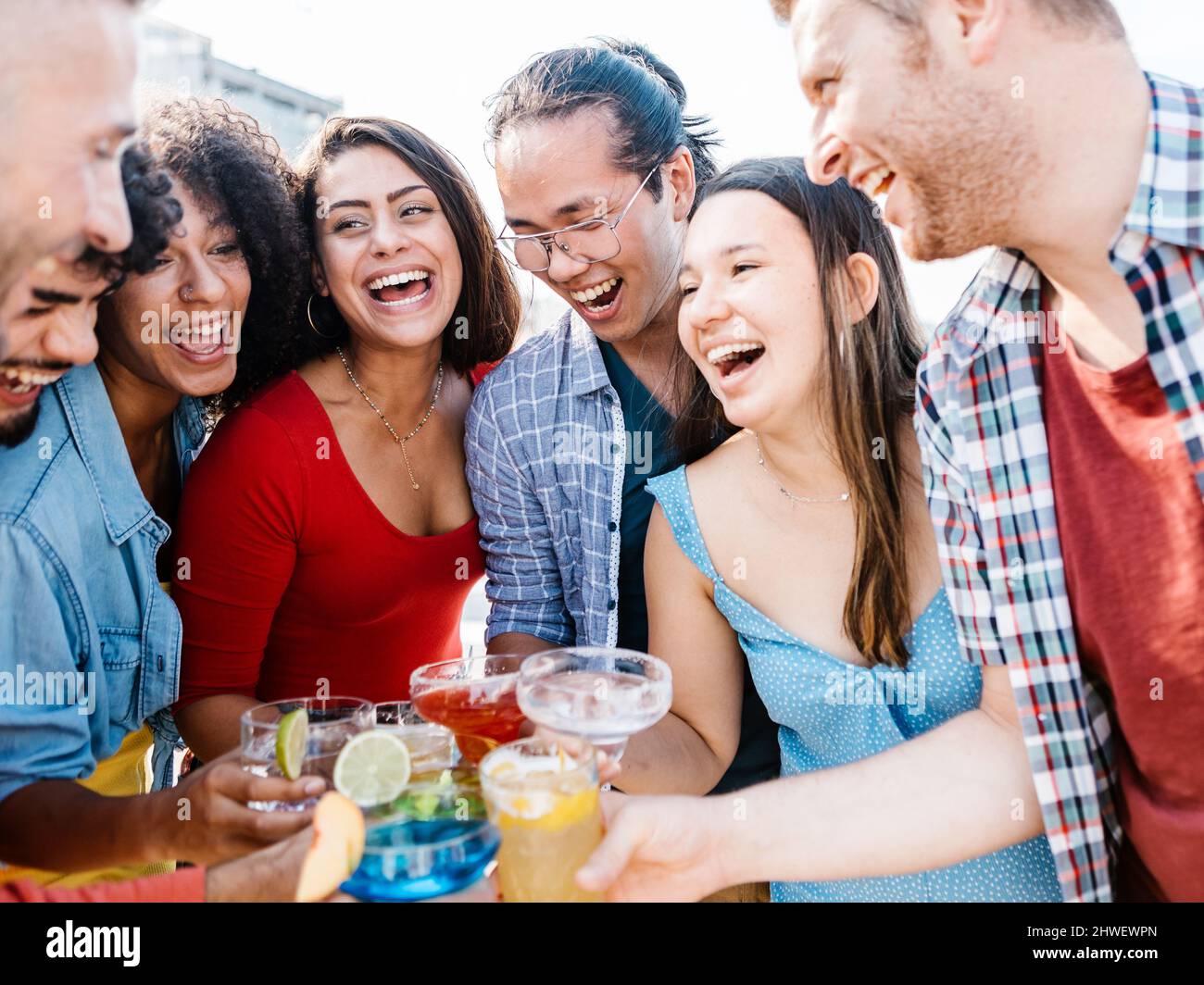 Group of young friends cheering with trendy summer cocktails Stock ...