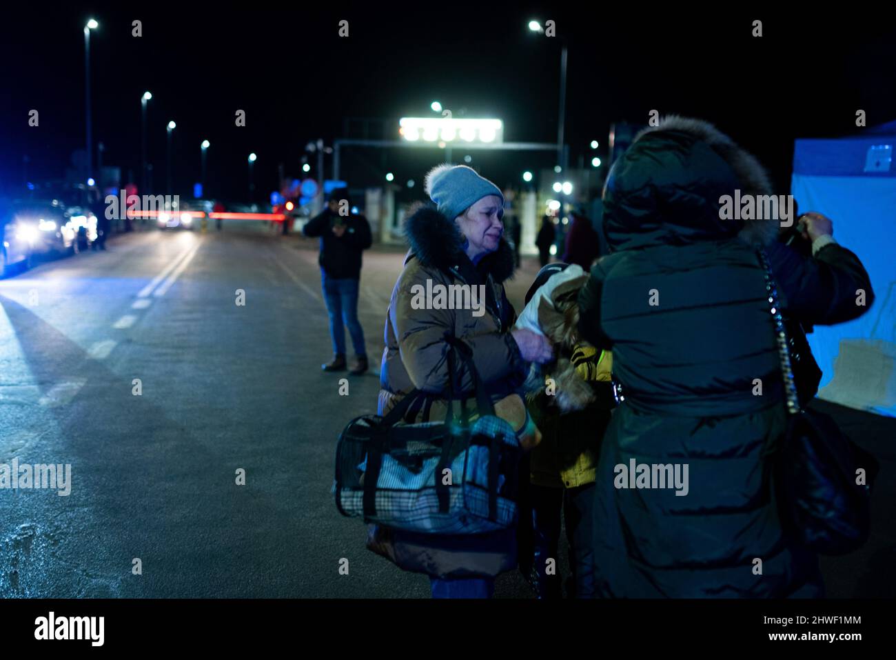Spain. 05th Mar, 2022. An old woman is seen crying moments after ...