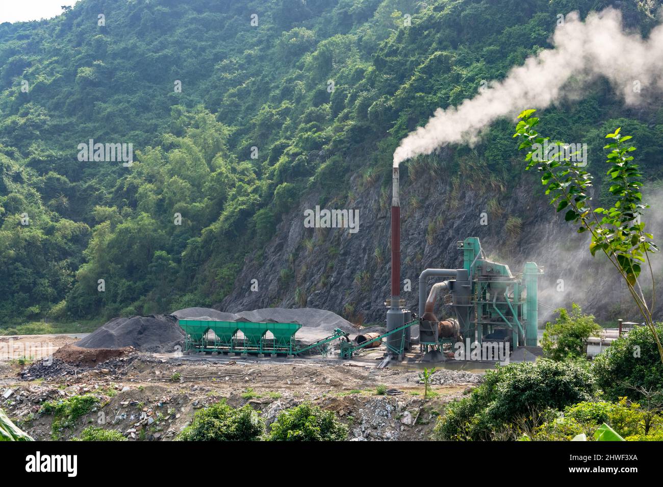 Asphalt hot mix plant. It is consists of cold aggregate system, drying ...
