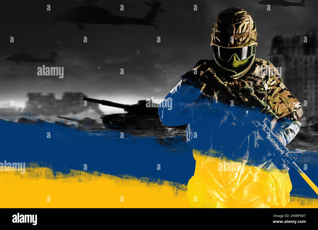 Photo of ukrainian soldier in full body armor holding rifle on ...