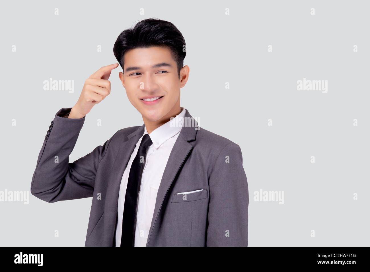 Portrait young asian business man in suit with smart thinking idea with ...