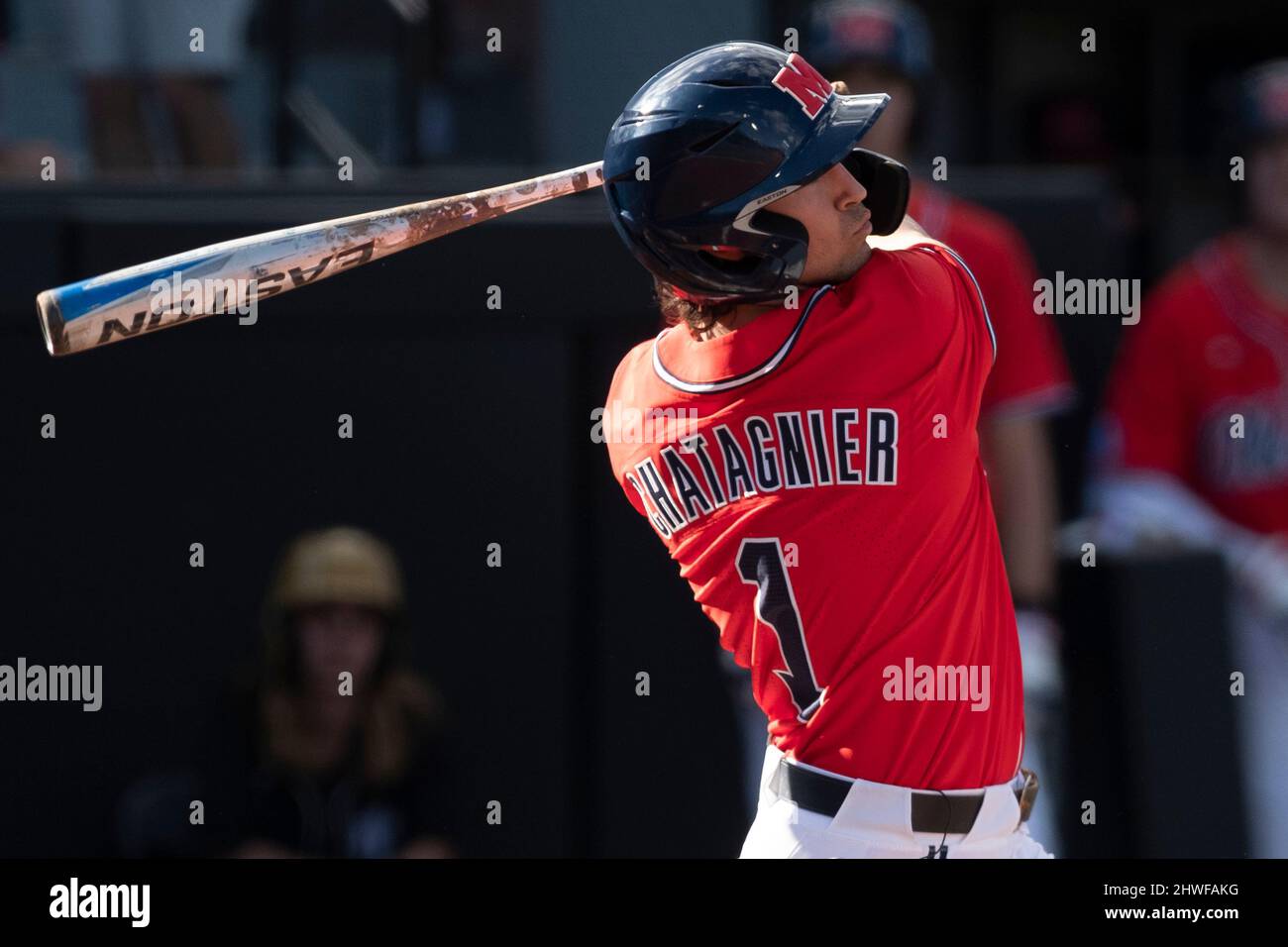 MARCH 05, 2022: Ole Miss Second baseman Peyton Chatangier (#1) swings ...