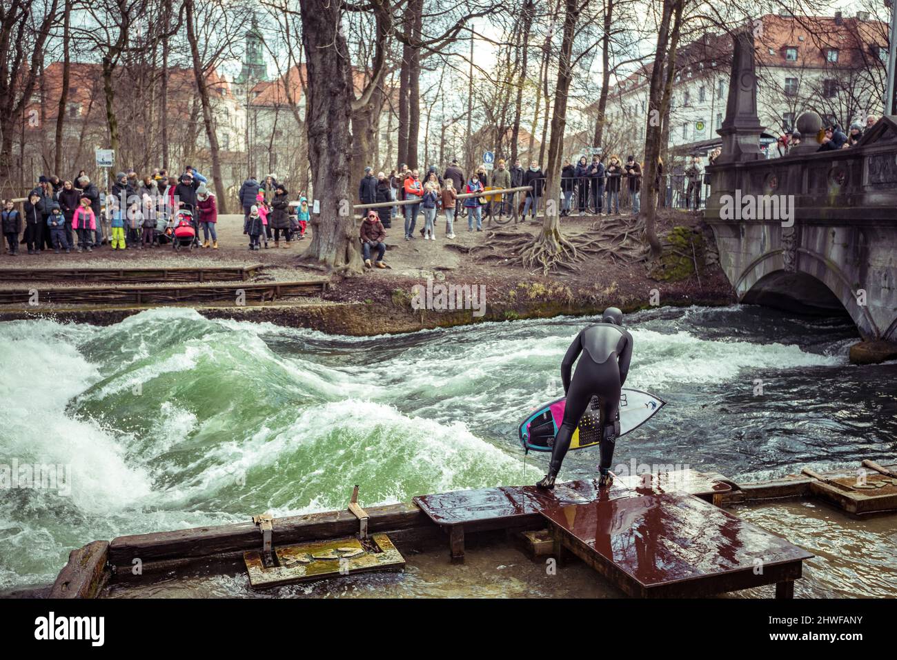 Munich, Germany, 27.02.2022: Winter river surfing on sunny day on ...