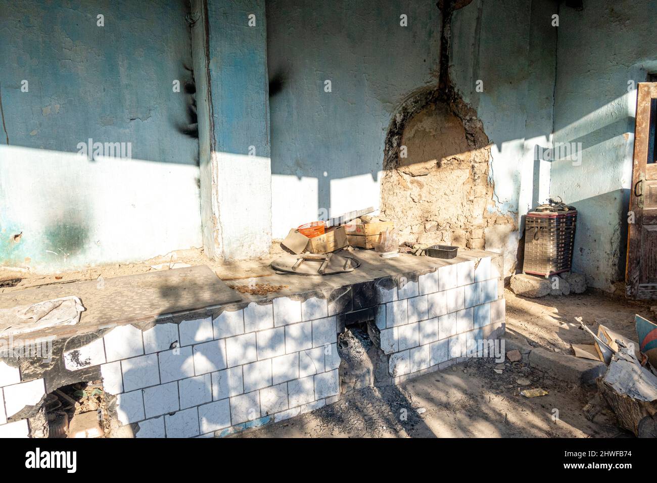 Delapidated house building construction showing layers of сement and ...