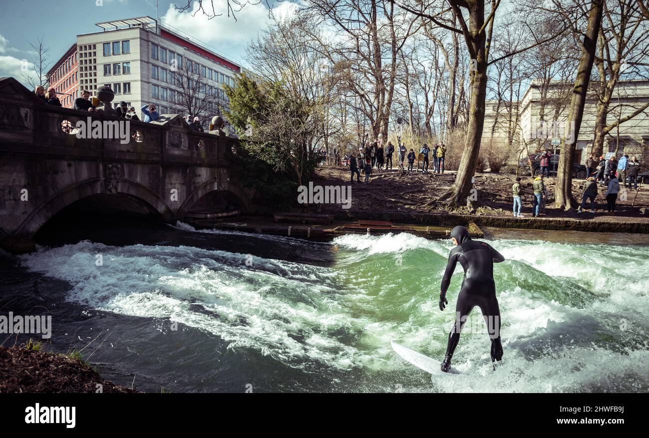 Munich, Germany, 27.02.2022: Winter river surfing on sunny day on ...
