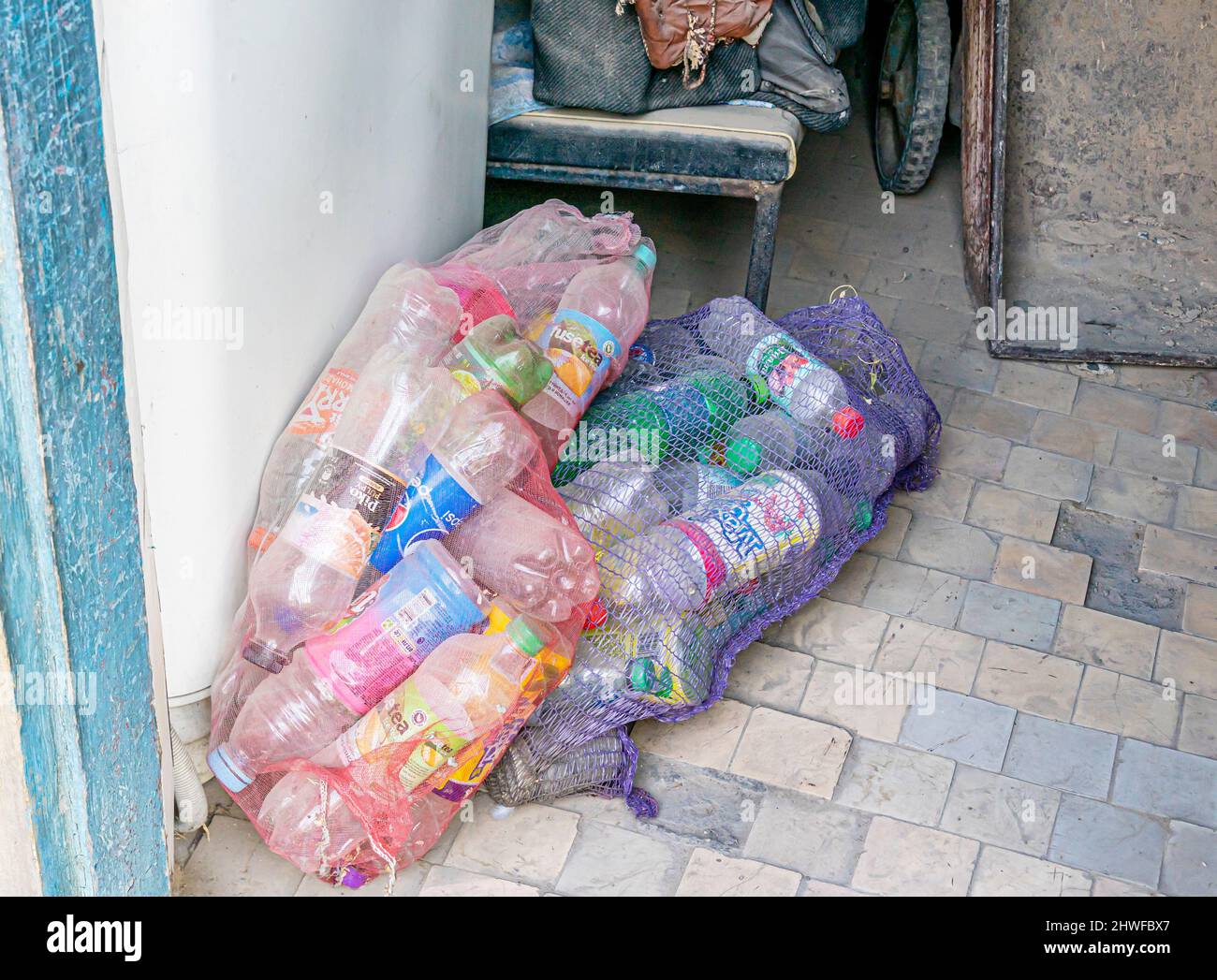 Plastic bottles wrapped packed Stock Photo - Alamy
