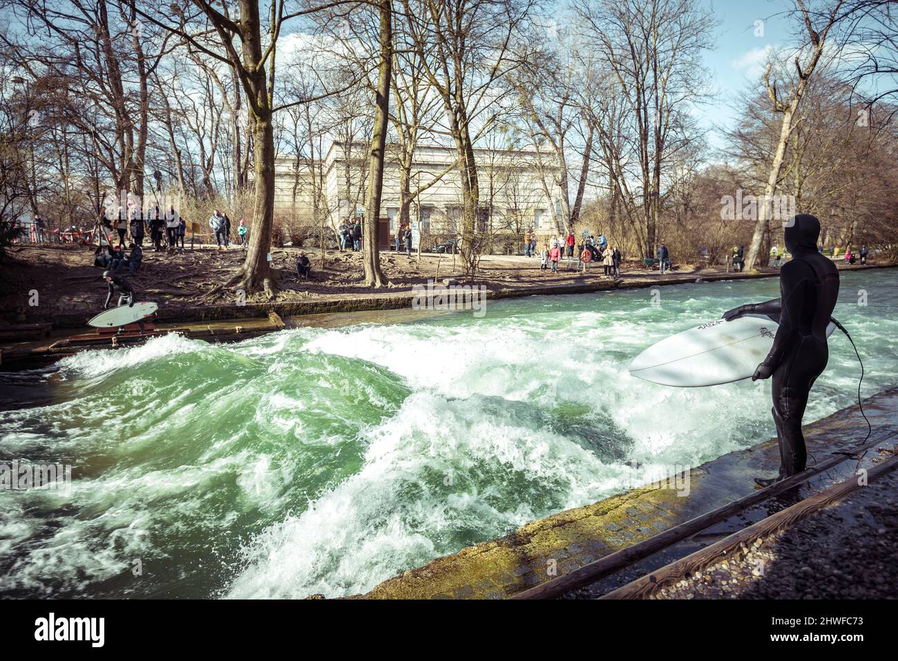 Munich, Germany, 27.02.2022: Winter river surfing on sunny day on ...