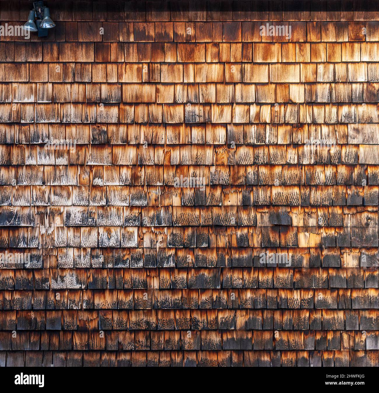 Details of a rustic farmstead barn. Siding with weathered wooden ...