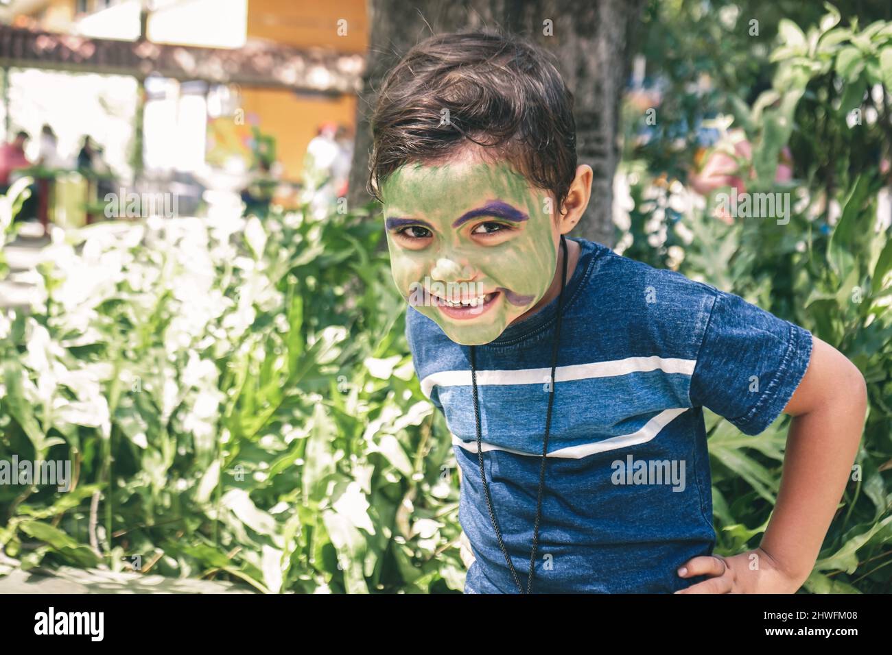 Horizontal photo of a Latin boy with his face painted Stock Photo - Alamy