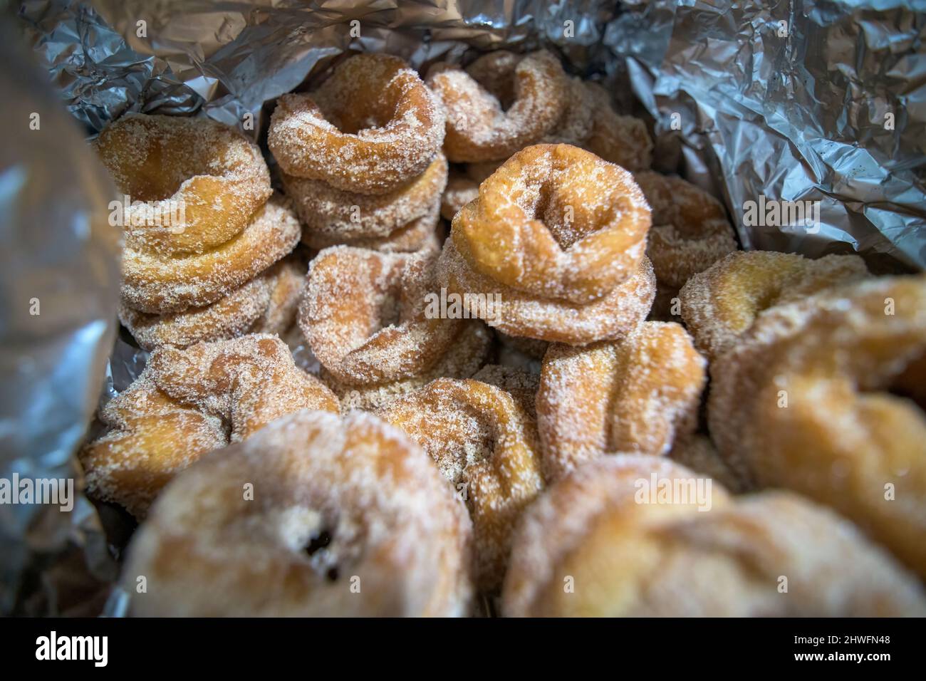 During Holy Week in Spain it is traditional to offer handmade donuts to ...