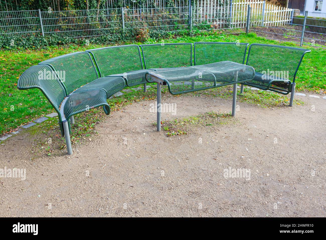 Modern outdoor benches . Seats in the spring park Stock Photo - Alamy