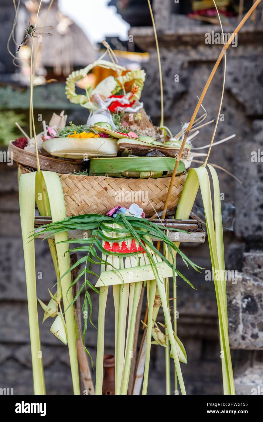 Traditional Balinese offerings for Nyepi celebration on the road along ...