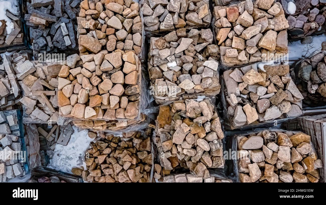 Snow is melting around the landscaping bricks showing signs of spring ...