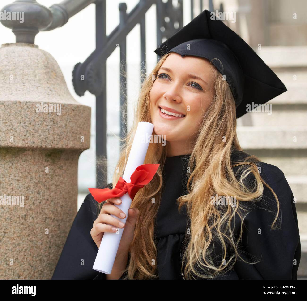 Dreaming of her perfect career. Inspired young graduate after ...