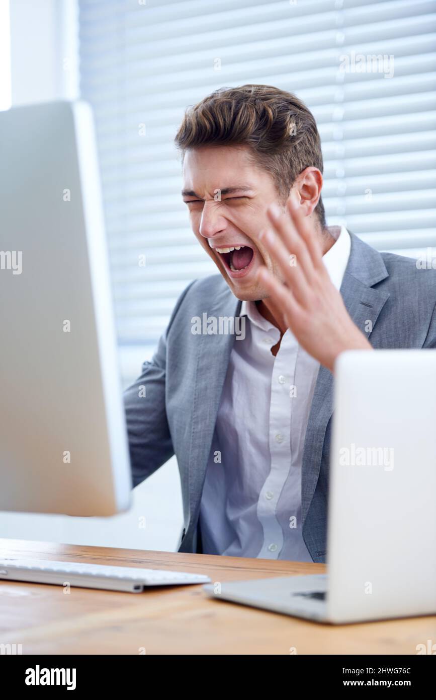 Hes young and ambitious. A handsome young executive working in his ...