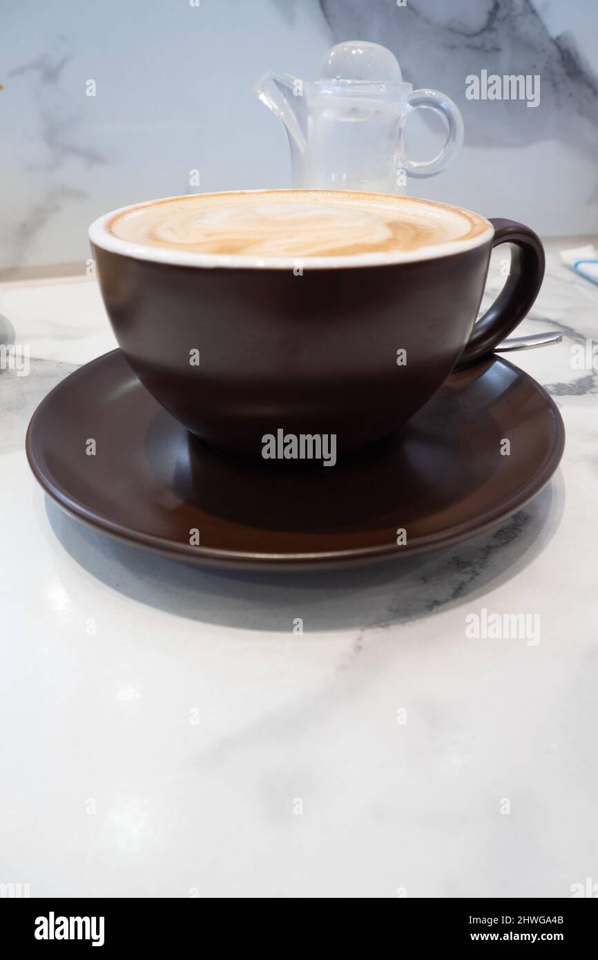 Texture surface of soft and delicate milk froth in a cup of coffee ...