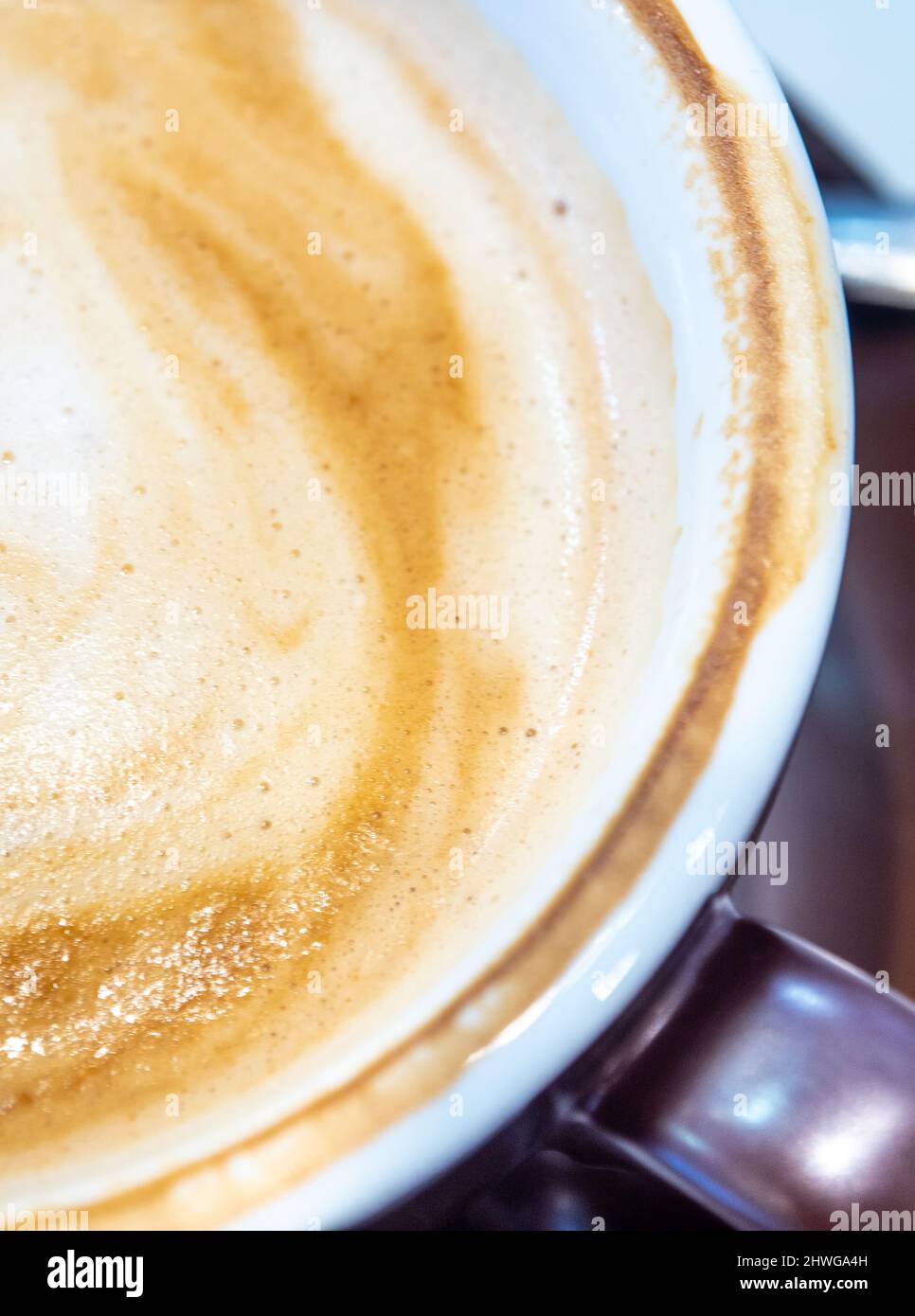 Texture surface of soft and delicate milk froth in a cup of coffee ...