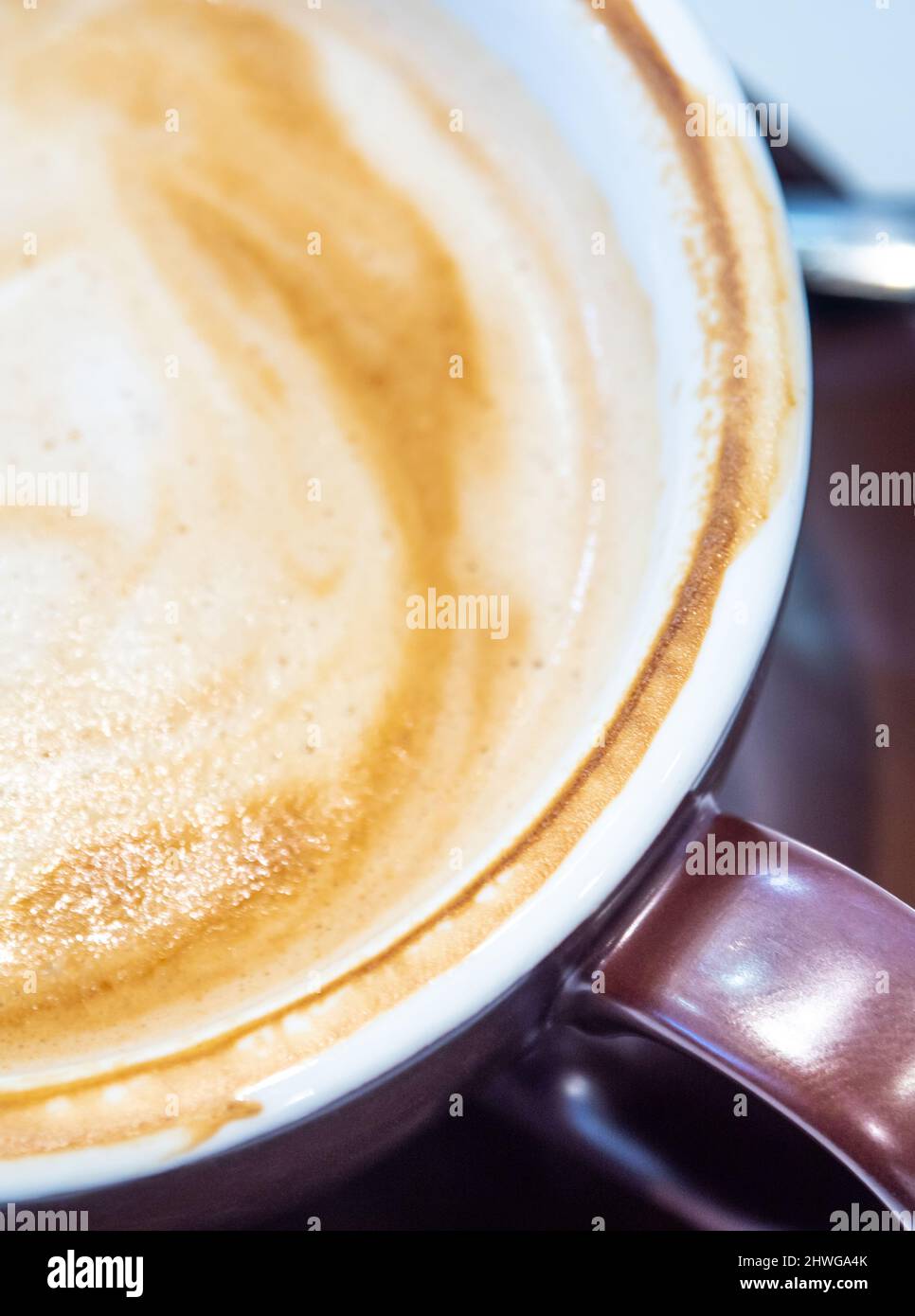 Texture surface of soft and delicate milk froth in a cup of coffee ...