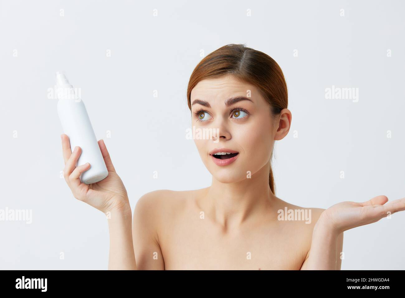 woman body lotion rejuvenation cosmetics Gray background Stock Photo ...