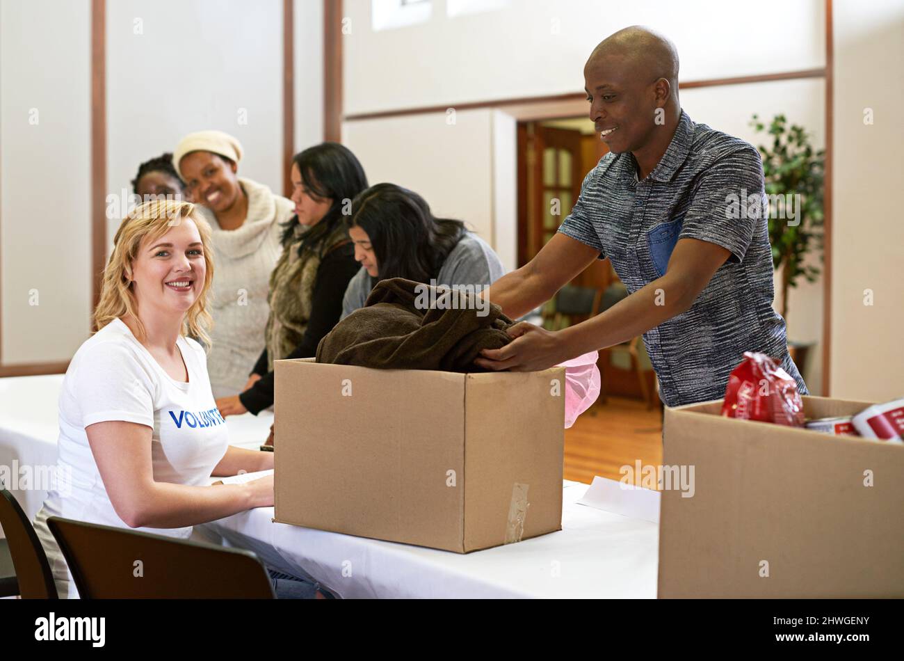Weve been getting so much clothing. Cropped portrait of a volunteer ...
