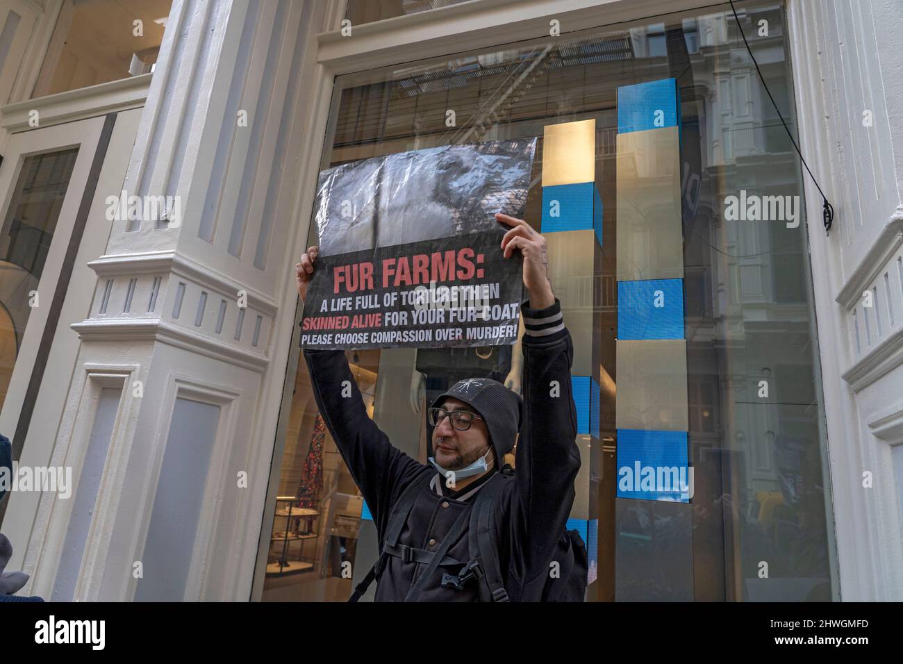 NEW YORK, NY - MARCH 05: Animal Rights Protesters holding signs protest ...