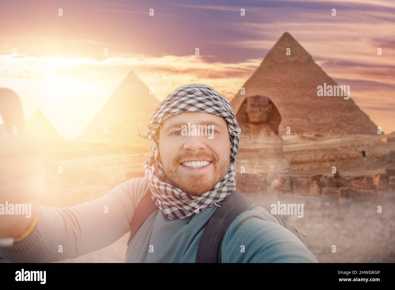 Travel Selfie photo man in hat background pyramid of Egyptian Giza and ...