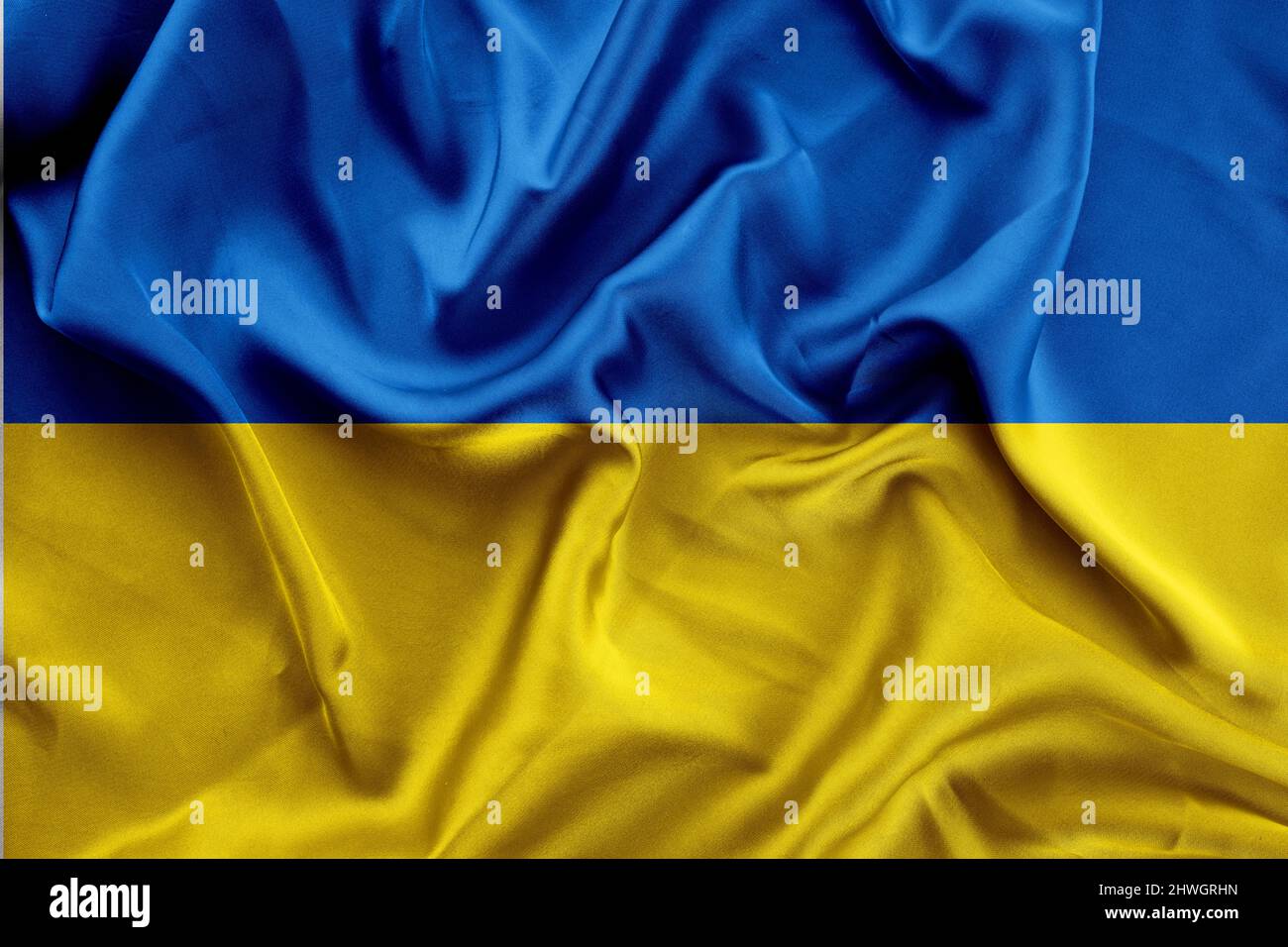 Fabric curved flag of Ukraine. Blue and yellow colors. UA flag ...