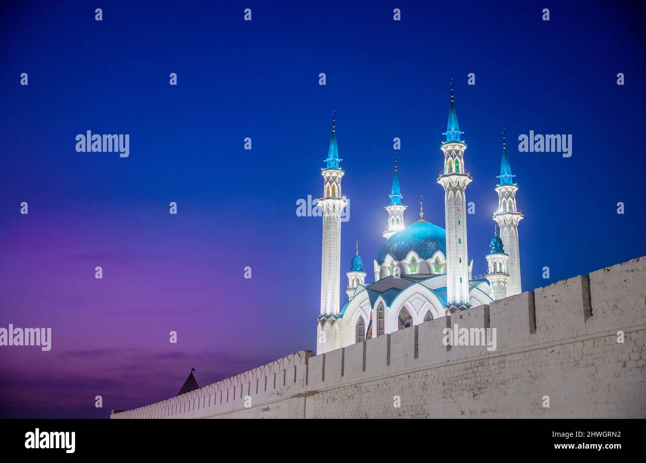 Beautiful white islamic mosque with blue roof background sunset and ...