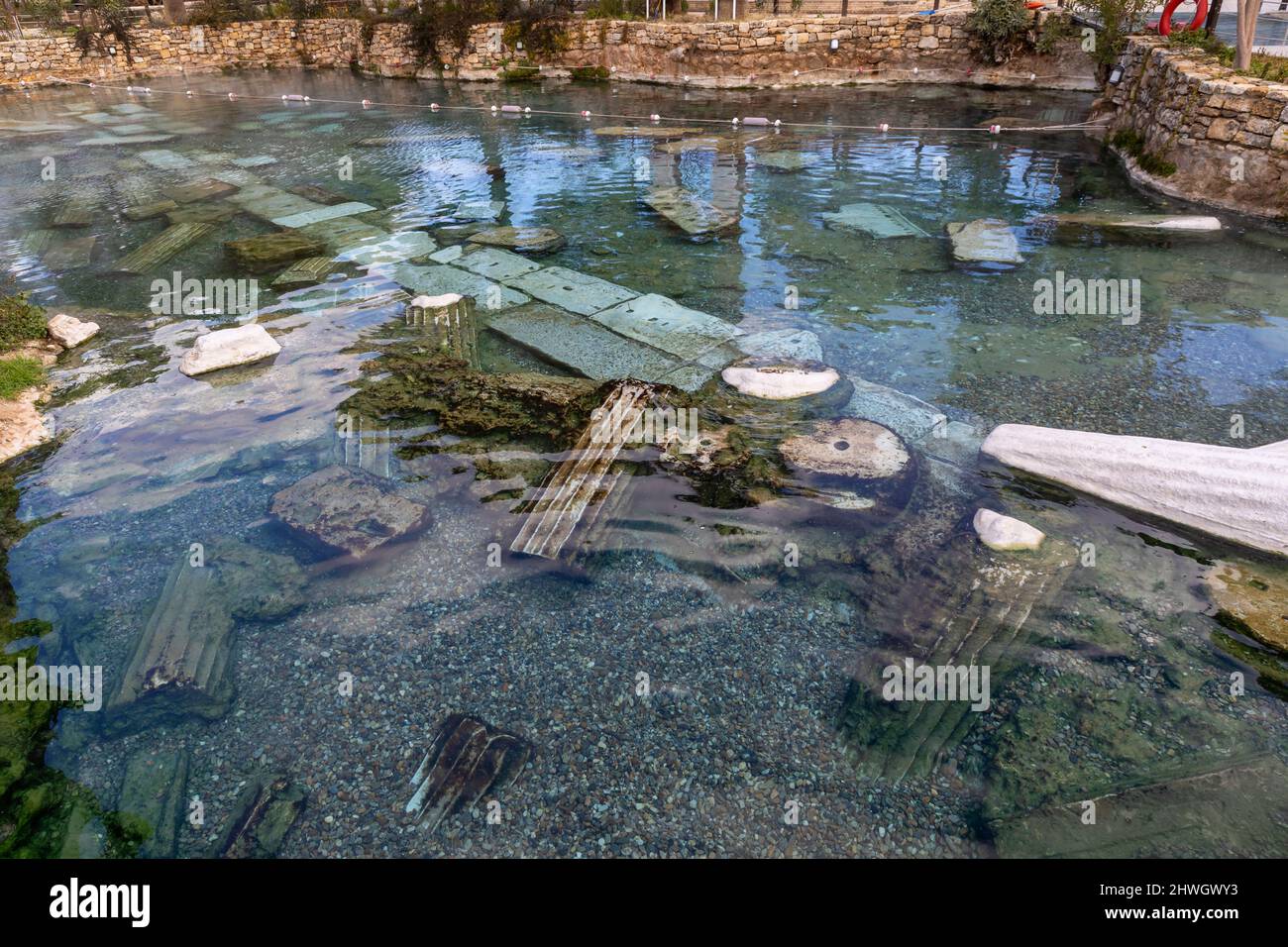 the Antique pool (Cleopatra's Bath) view in Pamukkale. It's a popular ...