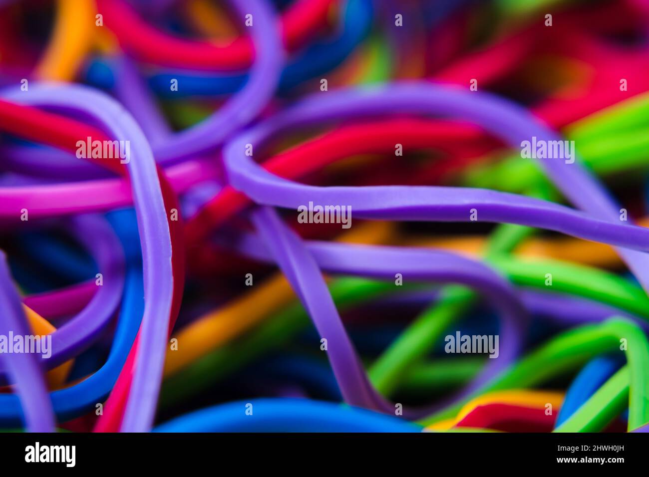 Colorful background rainbow colors rubber bands Stock Photo - Alamy