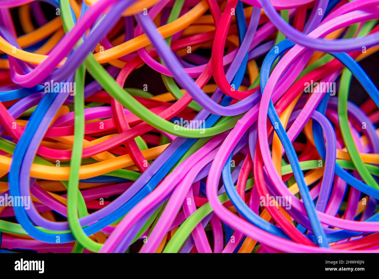 Colorful rainbow colors rubber bands Stock Photo - Alamy