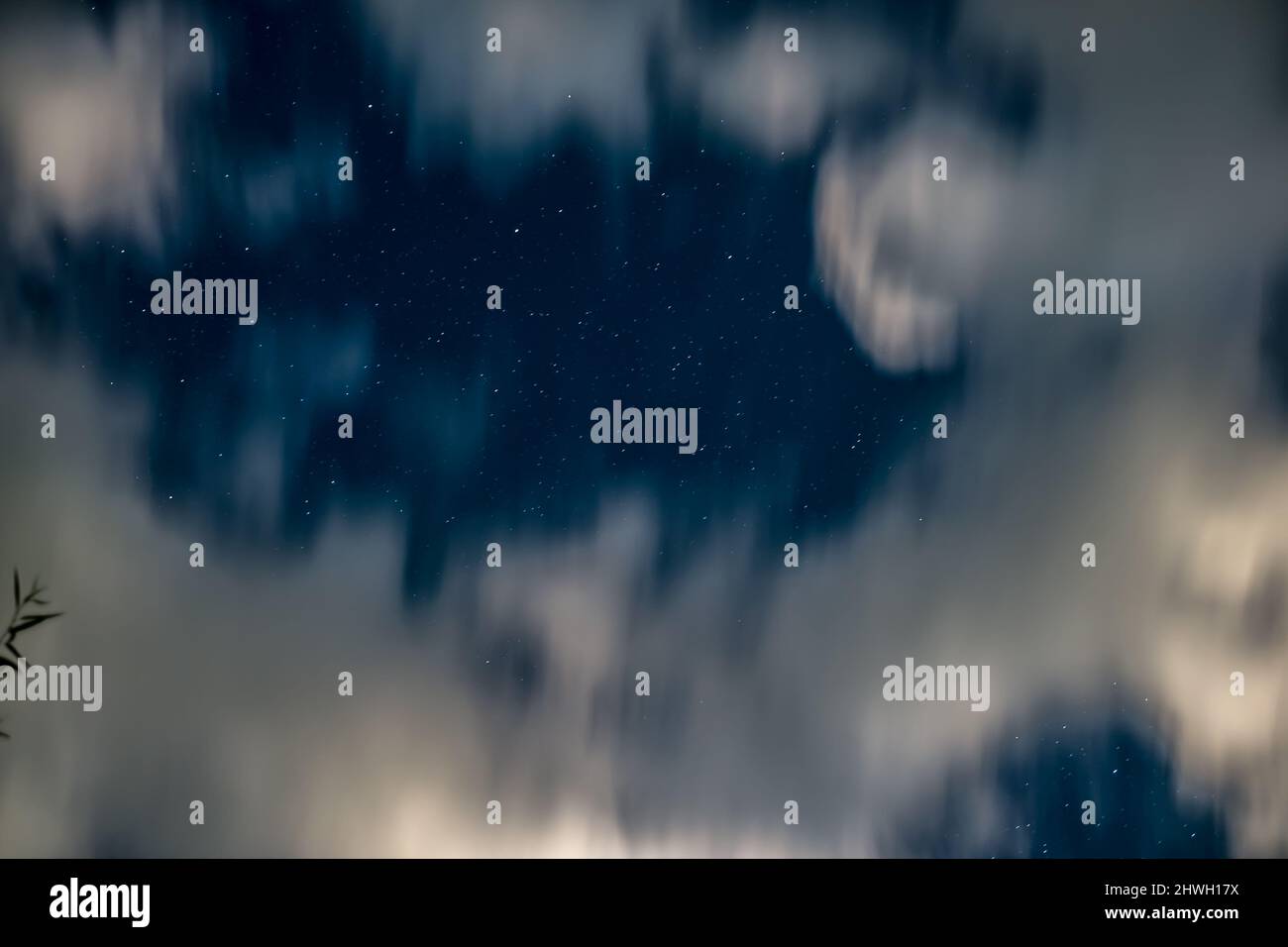 night sky with stars and clouds, motion blur Stock Photo - Alamy