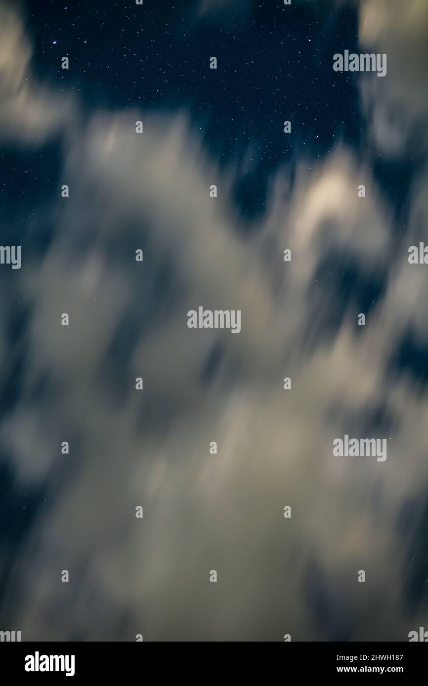 night sky with stars and clouds, motion blur Stock Photo - Alamy
