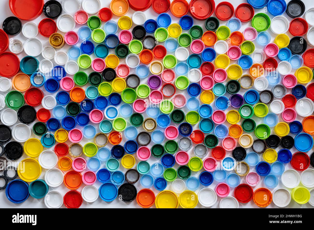Recycled Multicolored Plastic Bottle Caps Stock Photo - Alamy